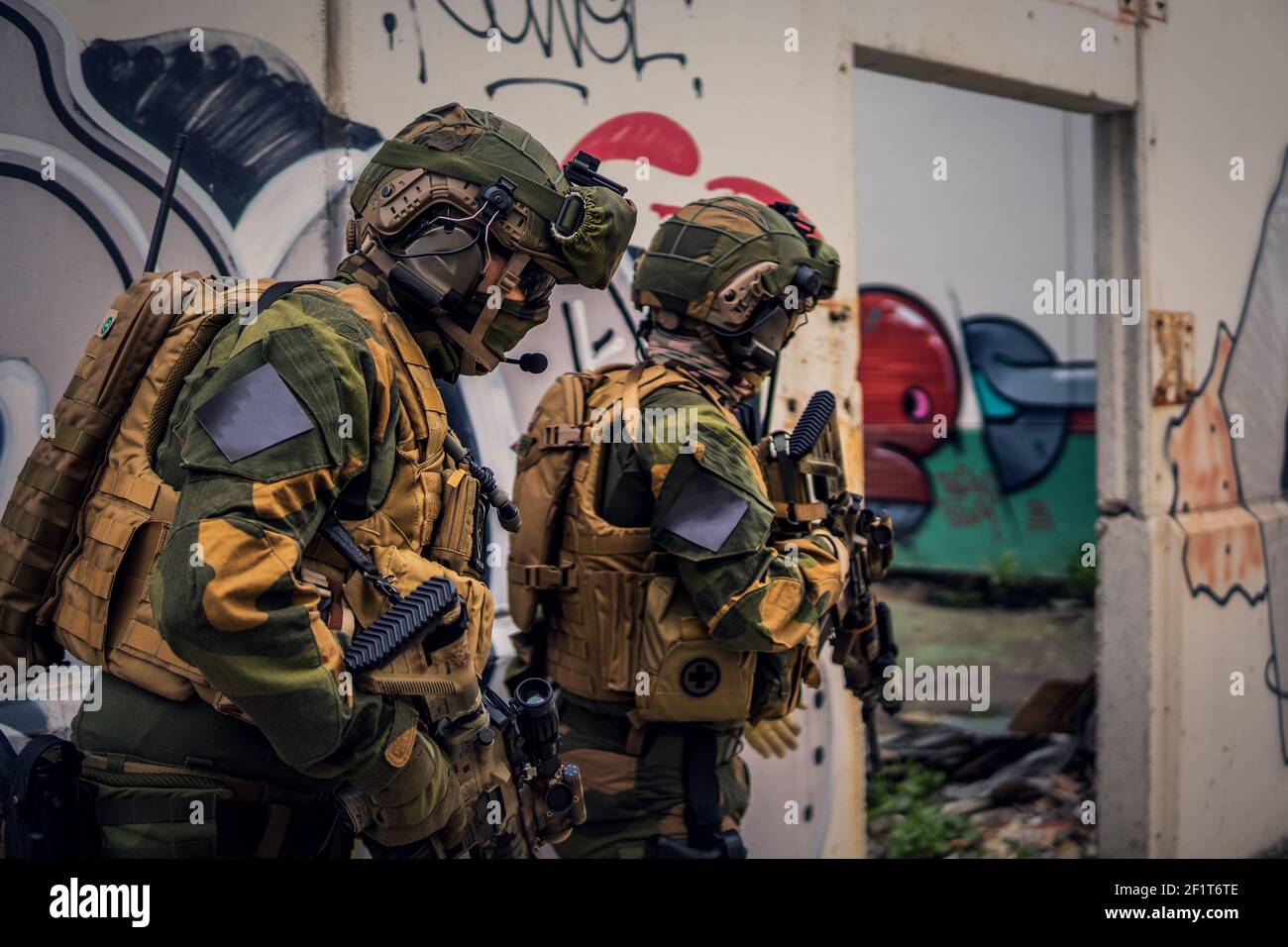 Fully equipped special forces soldiers in action, an operation in a ...