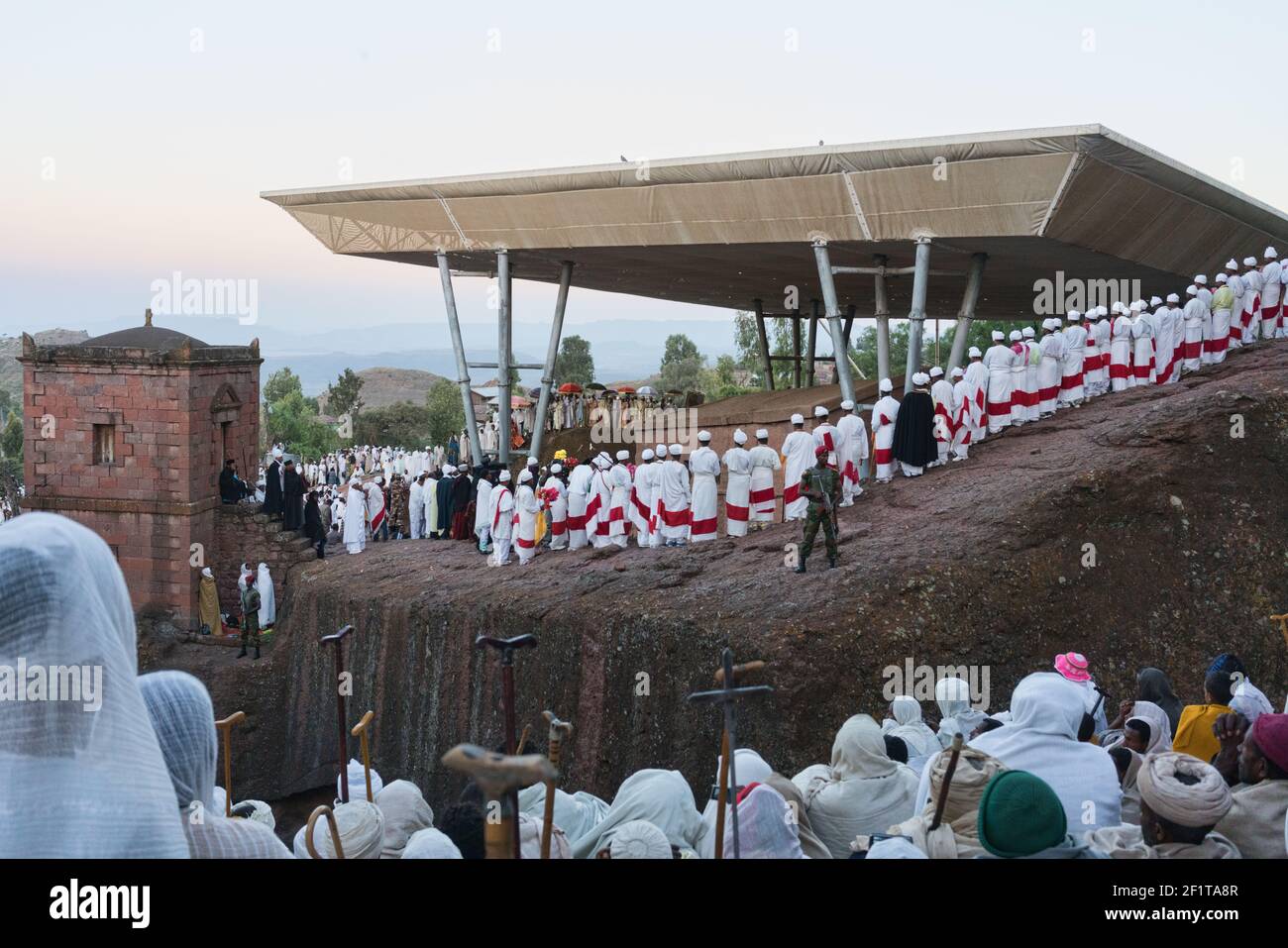 Ethiopia Lalibela lPilgrims watch the Christmas morning procession of ...