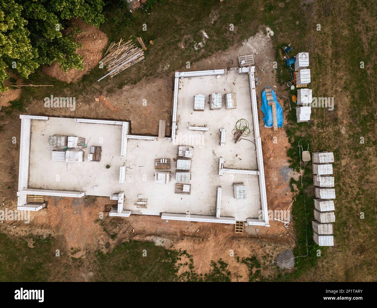 Aerial image of a new family house being built. New private housing ...