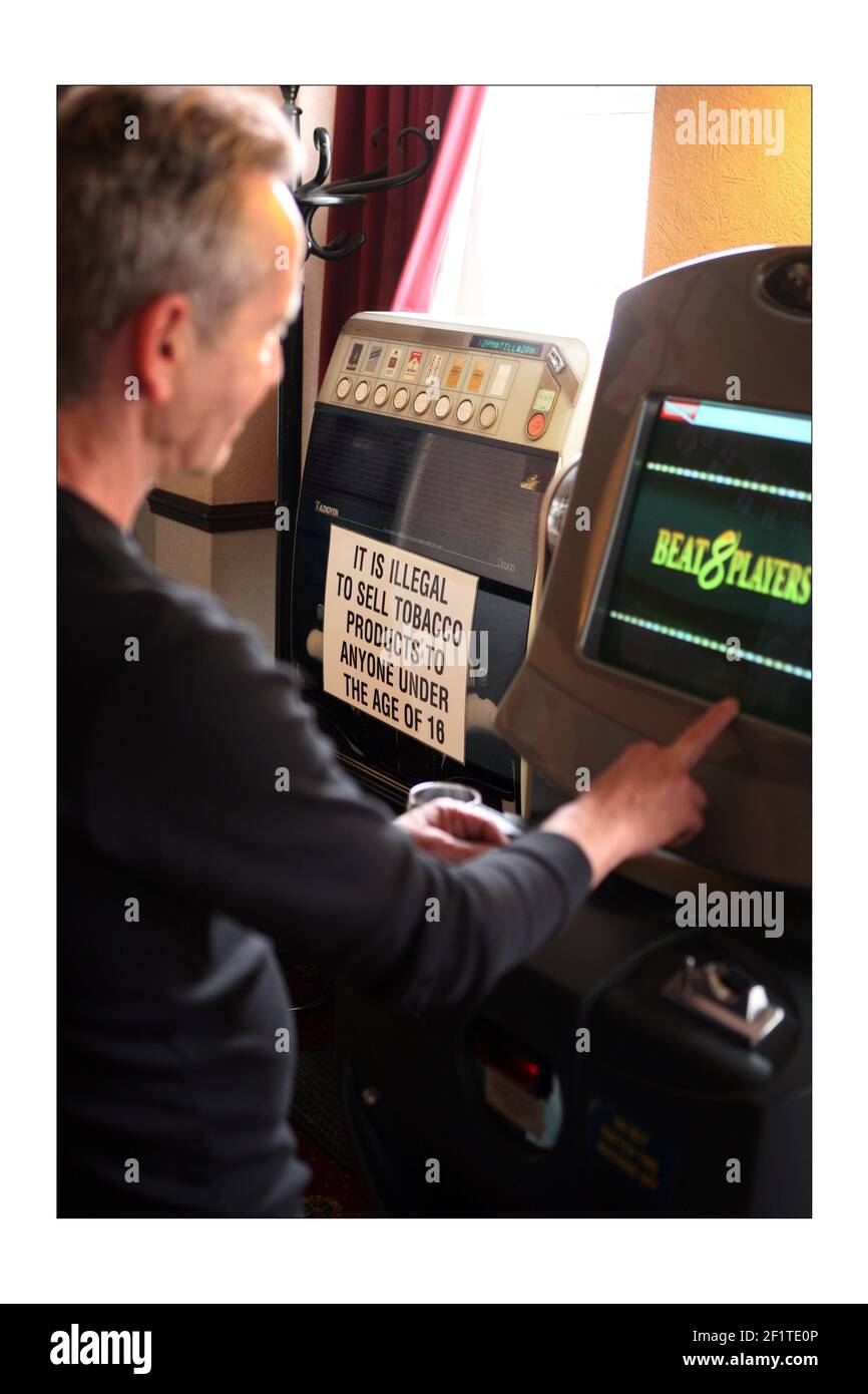 Cigarette dispencer in a Pub in SW Londonphotograph by David Sandison ...
