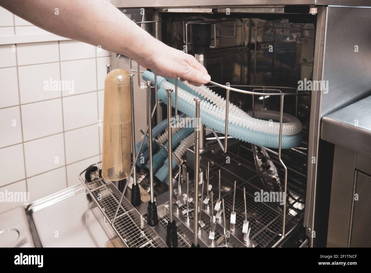in a sterilization department of a hospital, anesthesia tubes are ...