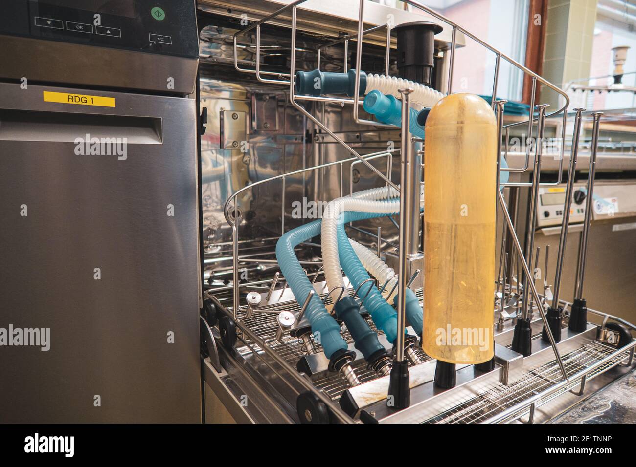 in a sterilization department of a hospital, anesthesia tubes are ...