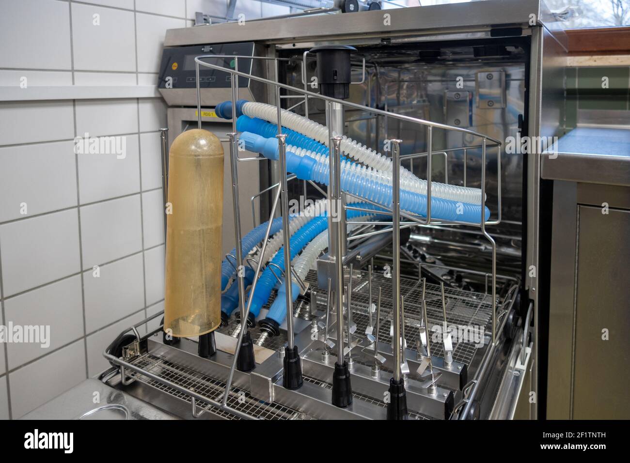 in a sterilization department of a hospital, anesthesia tubes are ...