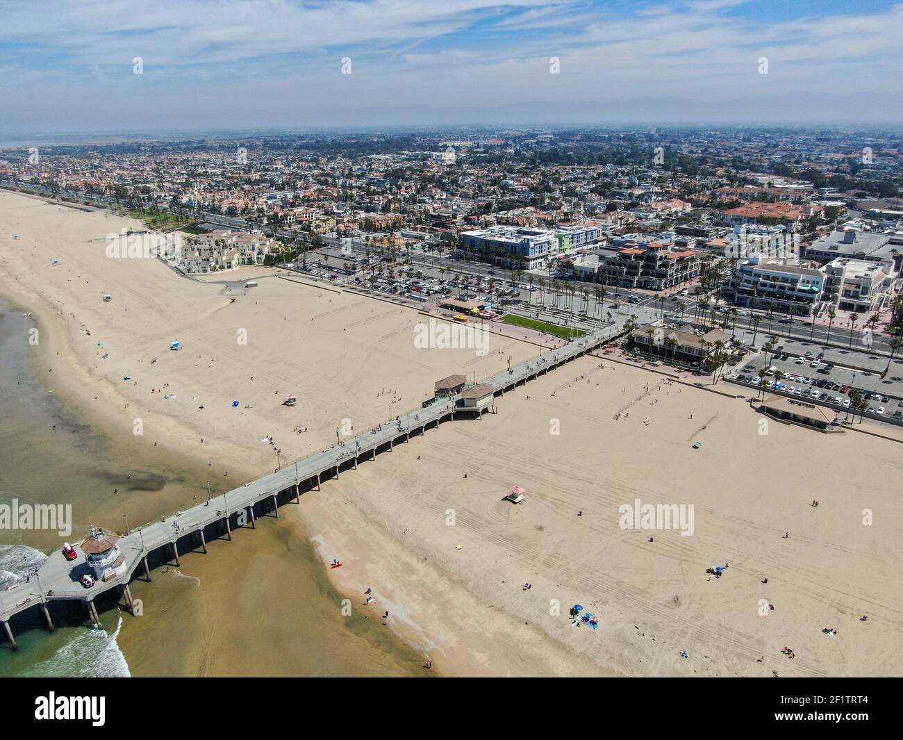 Aerial view of Huntington Pier, beach and coastline during sunny summer ...