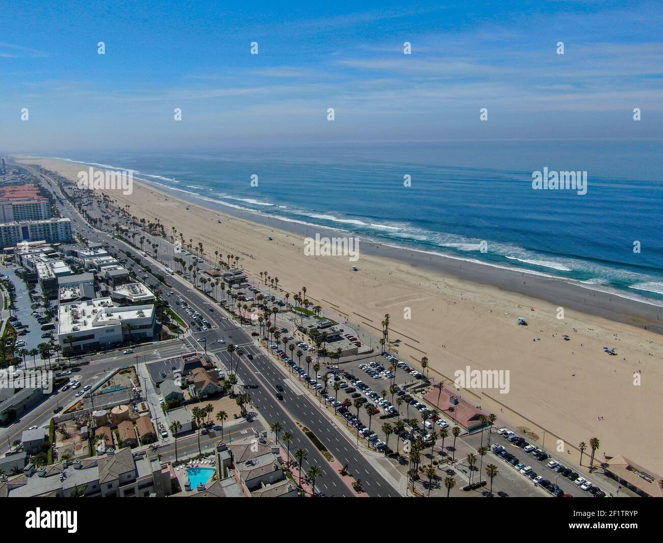 Aerial view of Huntington Pier, beach and coastline during sunny summer ...