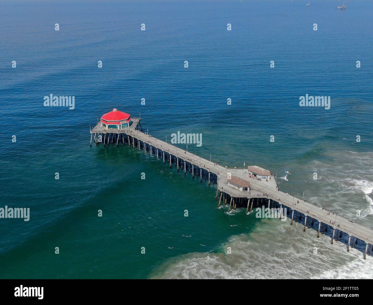 Aerial view of Huntington Pier, beach and coastline during sunny summer ...