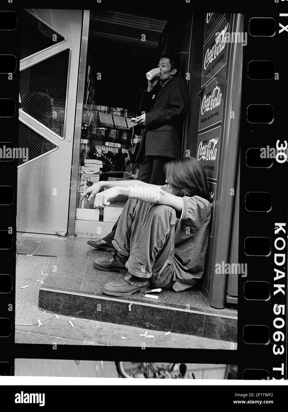 Homeless man male sitting Black and White Stock Photos & Images - Alamy