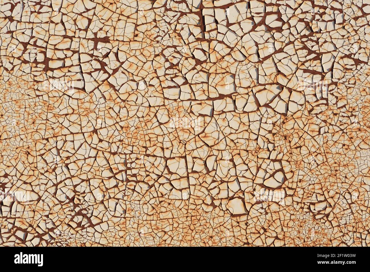 Rugged texture of finely cracked paint on rusty surface background ...