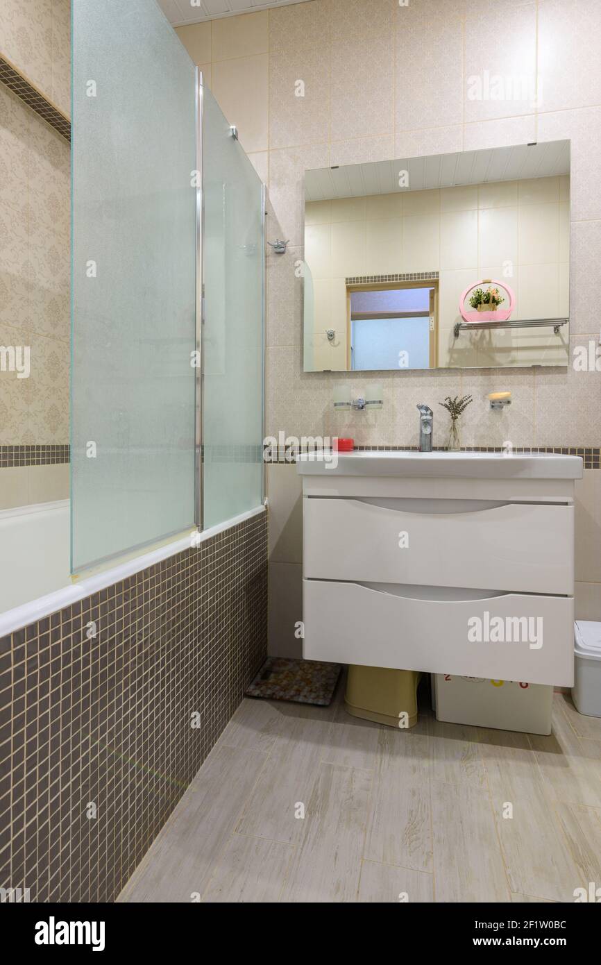 Glass shower partition in the bathroom interior Stock Photo - Alamy