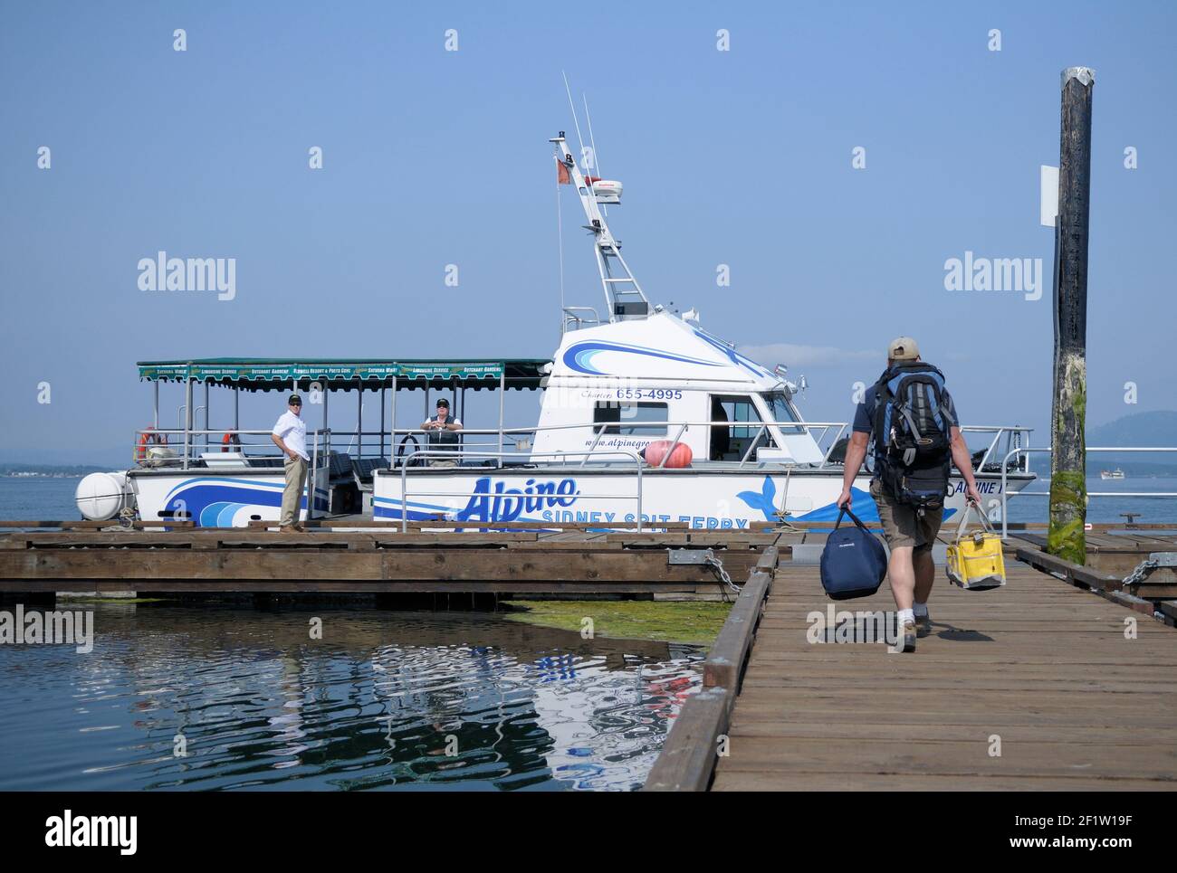 Passenger ferry Alpine II loading passengers, Sidney Spit, Gulf Islands ...