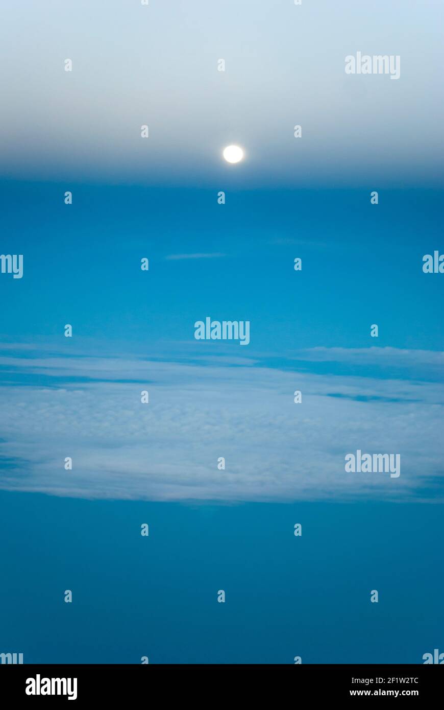 Aerial view of the moon and clouds from an airplane Stock Photo - Alamy