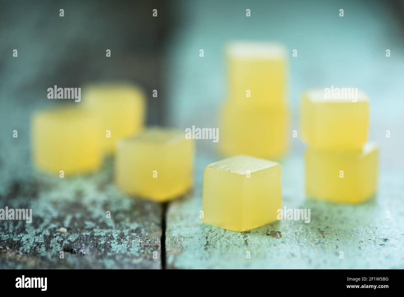 Vegan sweets. Homemade agar jelly cubes on shabby rustic background ...