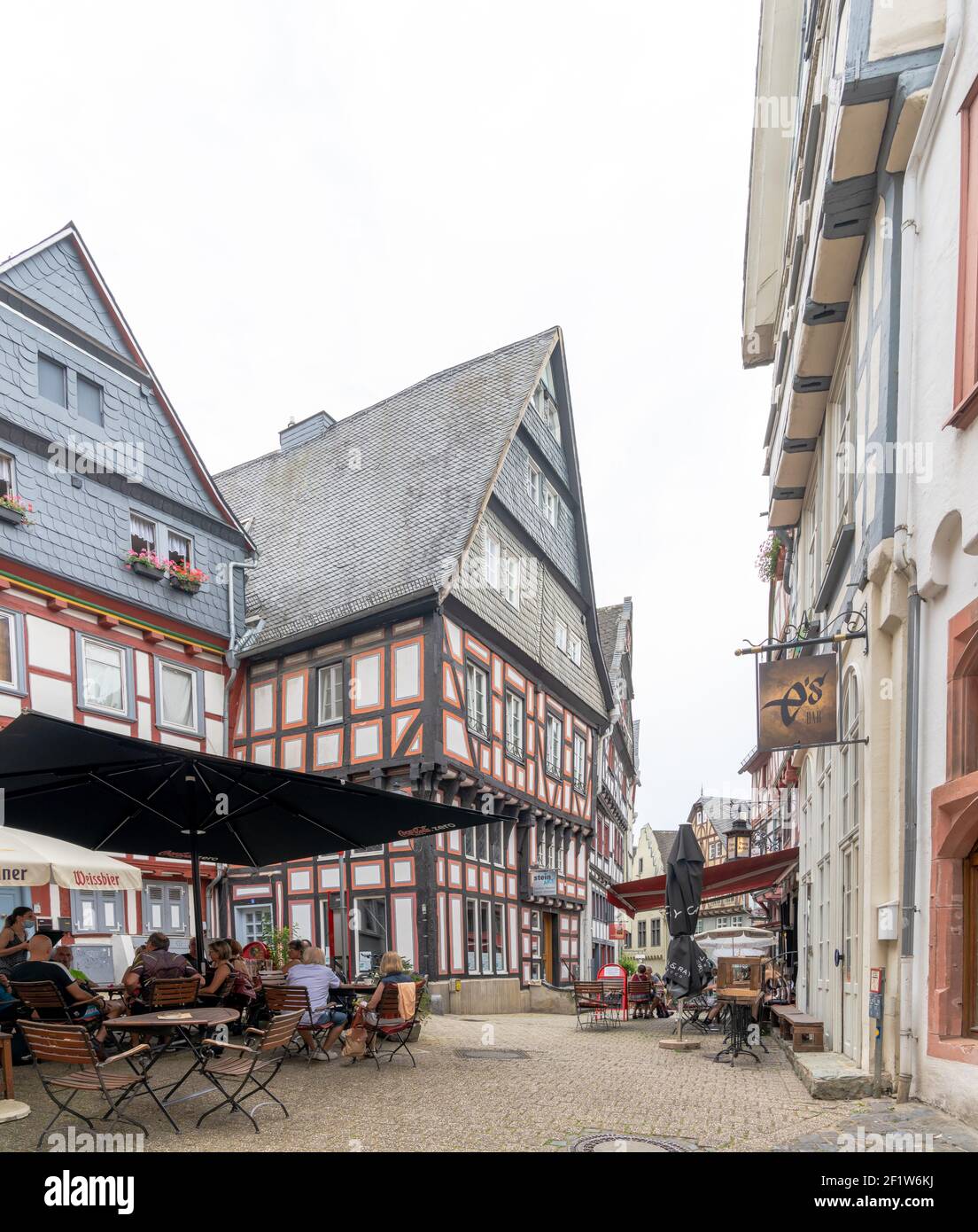 People enjoying a summer day in the old city of historic Limburg Stock ...