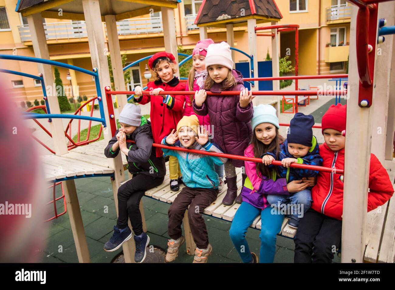 Cheerful kids at outdoor playground in early spring Stock Photo - Alamy