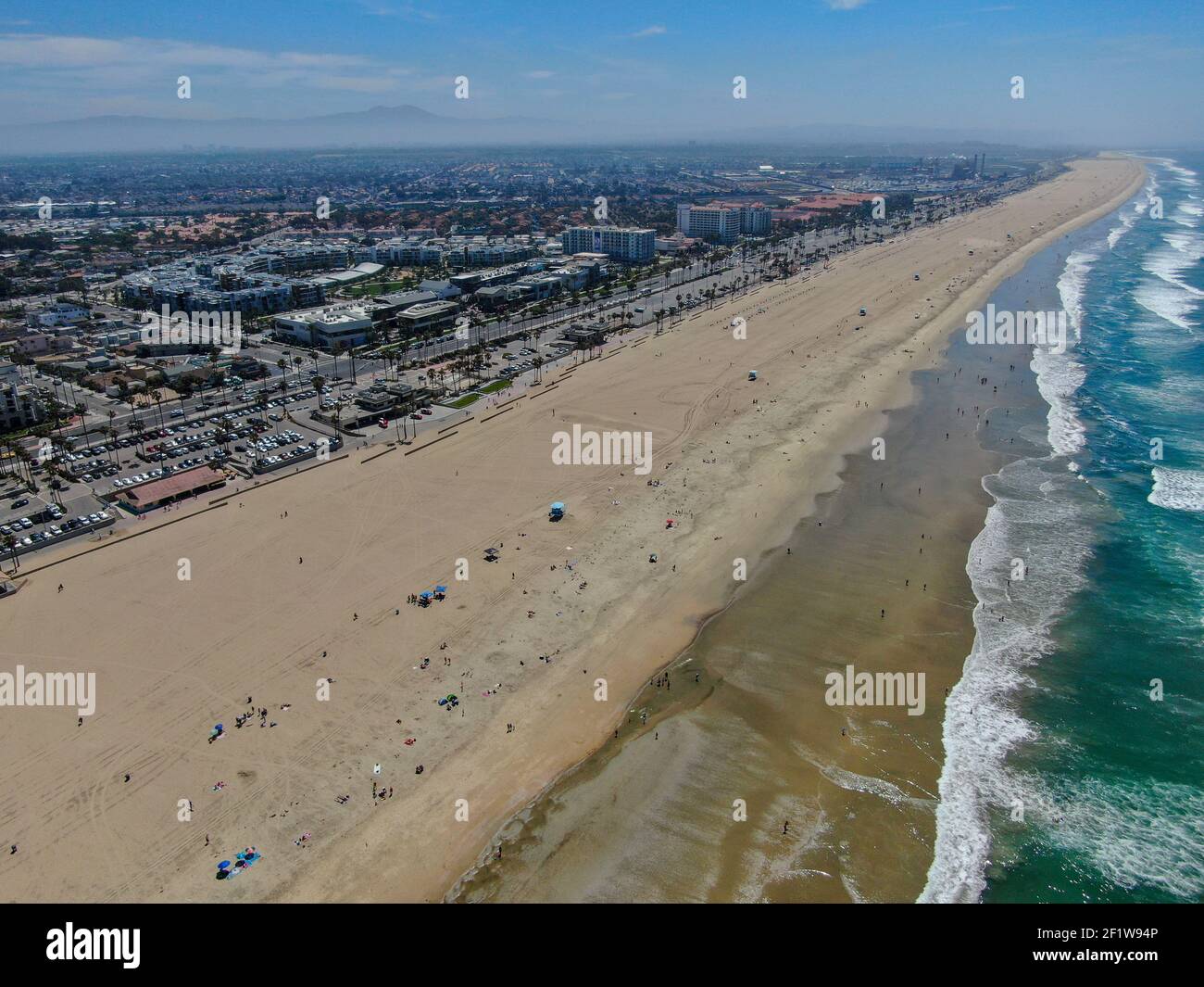 Aerial view of Huntington Beach and coastline during hot blue sunny ...