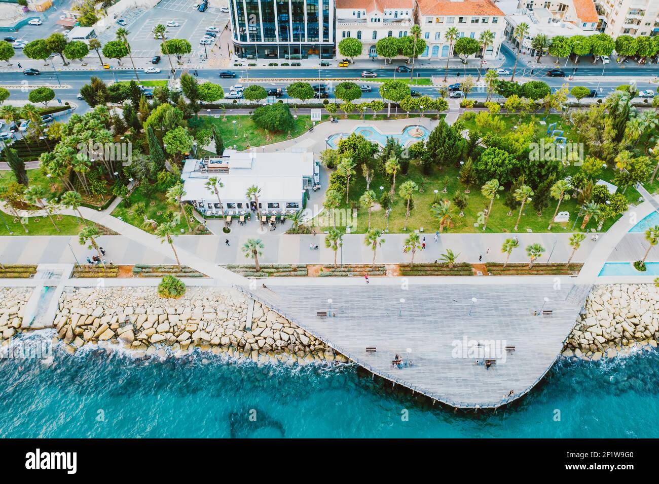 Molos Promenade park with alley and wooden pier for walking people ...
