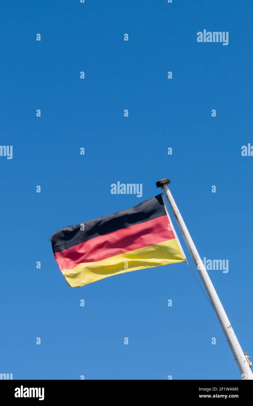 German flag flying in hi-res stock photography and images - Alamy