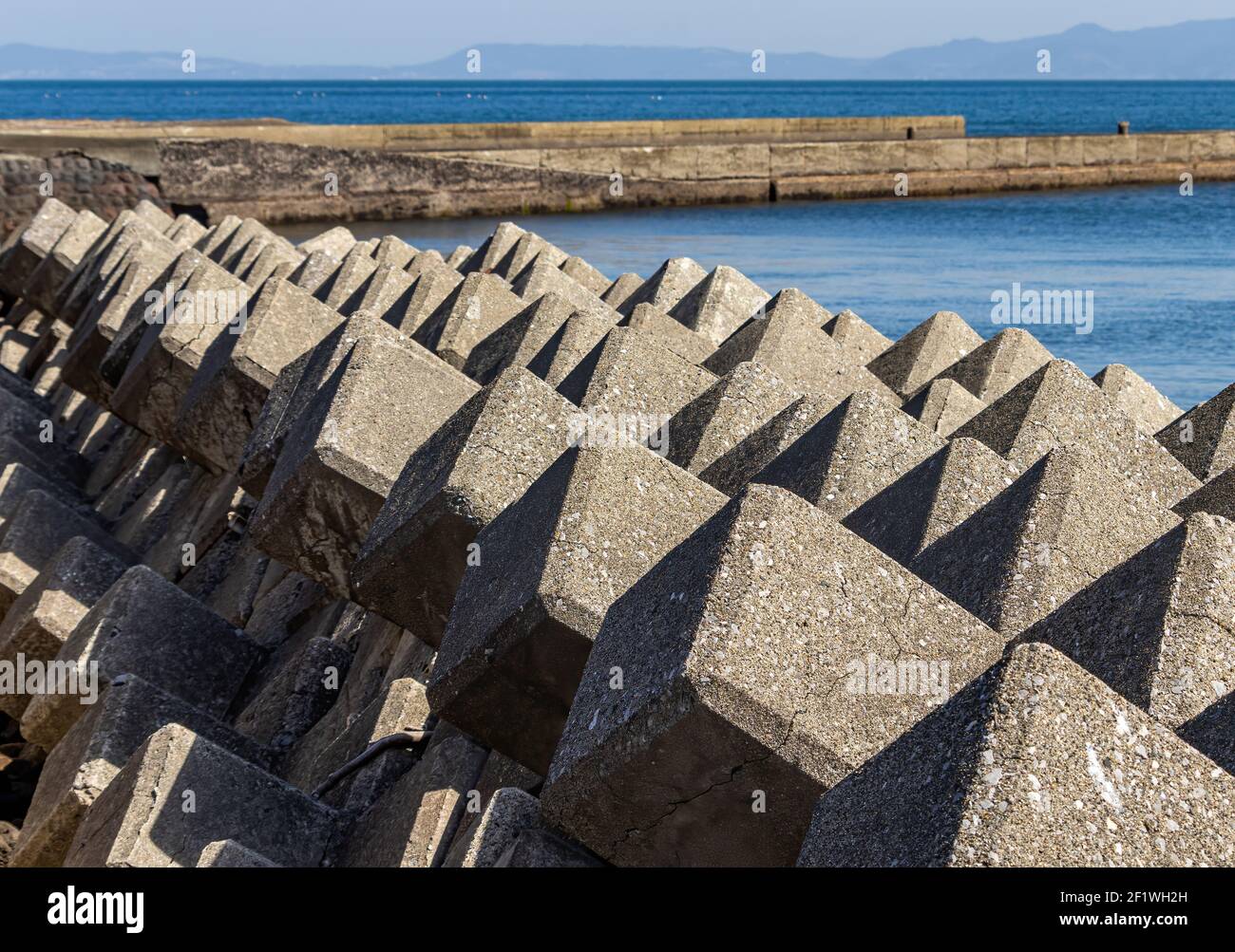 Besides breakwaters and marina being used against ocean waves, huge ...