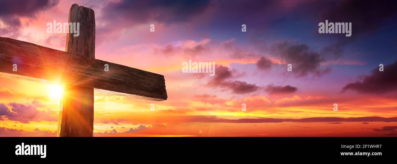 Crucifixion Of Jesus - Wooden Cross As Sunset Stock Photo - Alamy