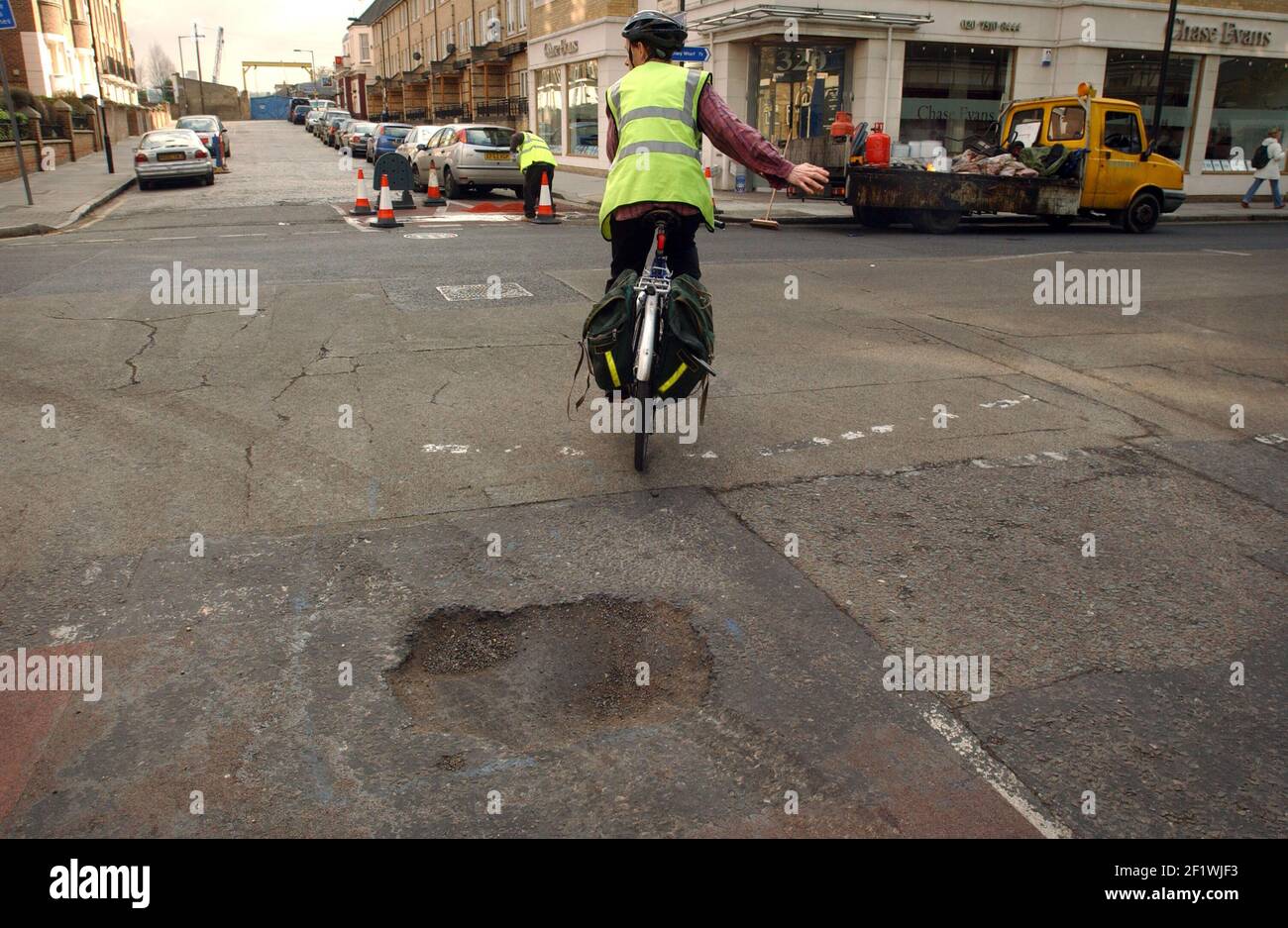 Bikes and Potholes 2/2/07 Tom Pilston Stock Photo - Alamy