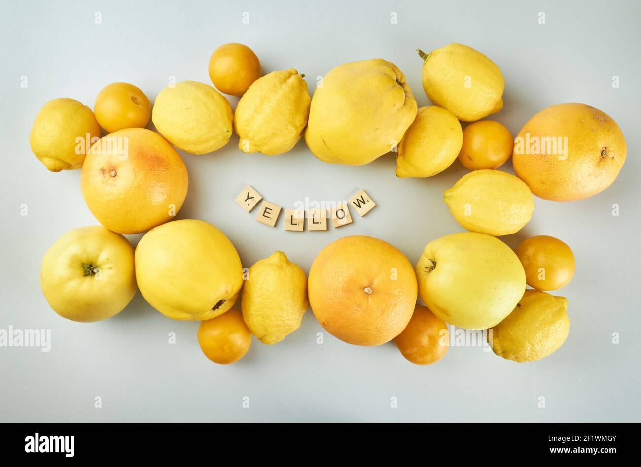 fresh yellow fruits on white background Stock Photo - Alamy