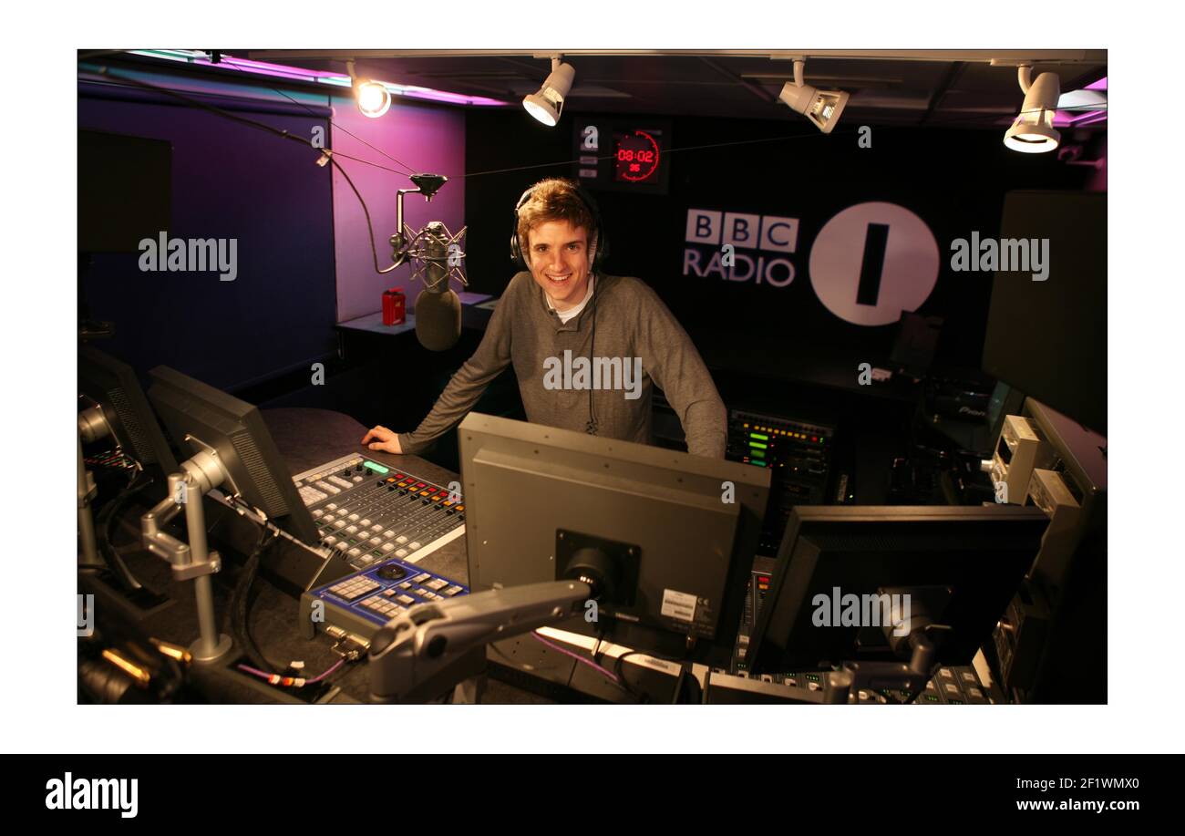 Radio ! early morning DJ Greg James in a studio at bbc radio 1 in Londonphotograph by David ...