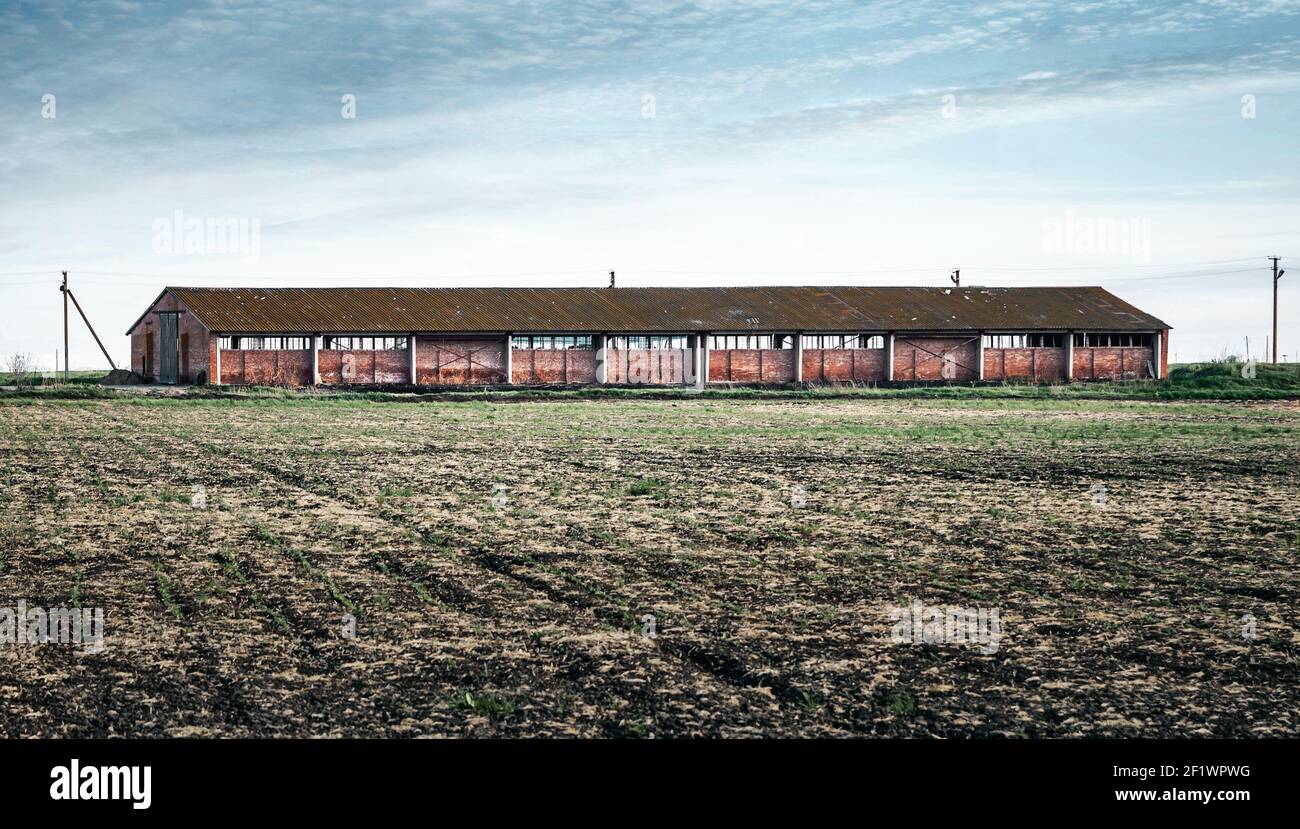 Old rustic farm on a background of blue sky Stock Photo - Alamy