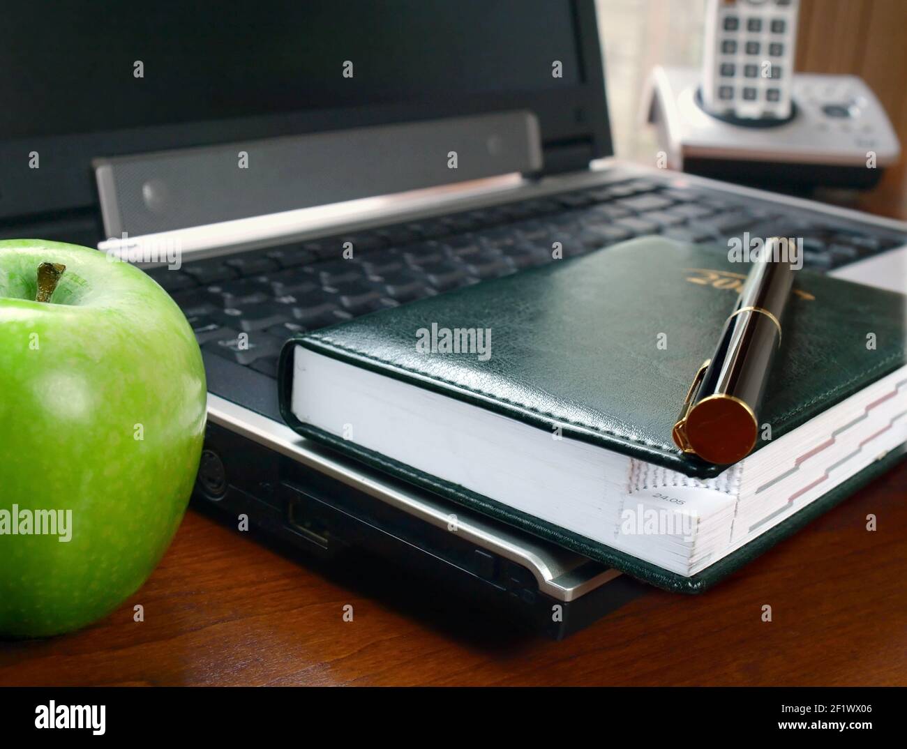 Apple daily office hi-res stock photography and images - Alamy