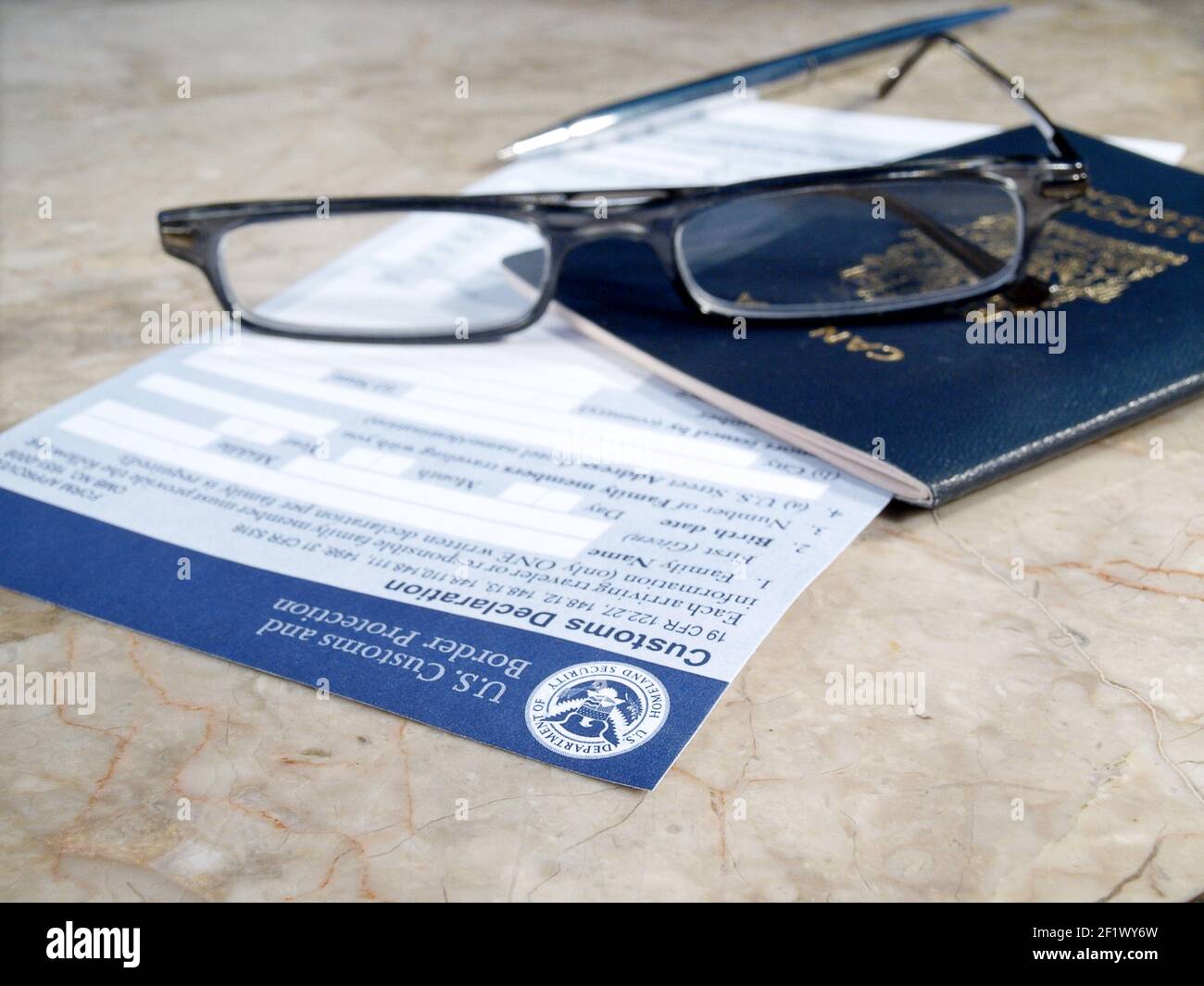 Passport on U.S. customs and border form Stock Photo - Alamy