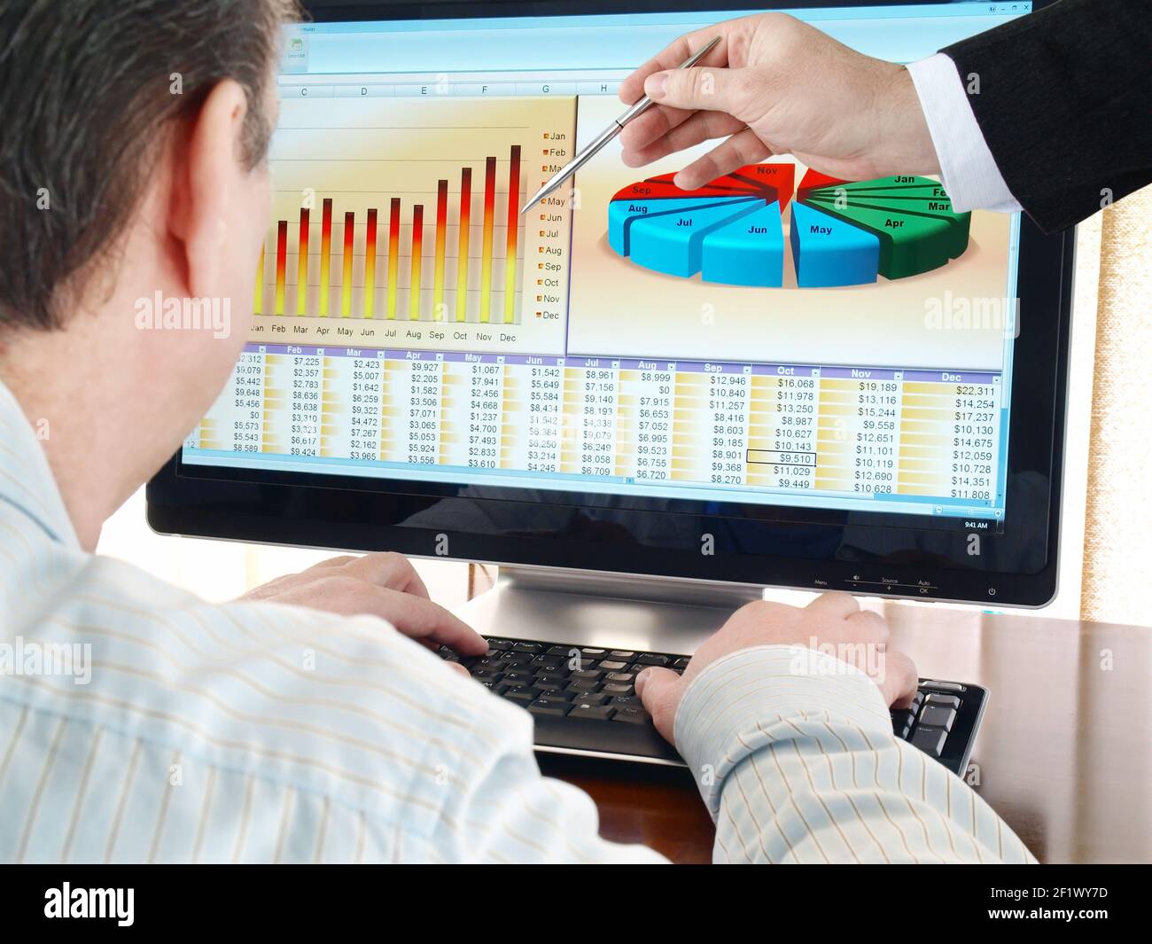 Analysing data on computer Stock Photo - Alamy