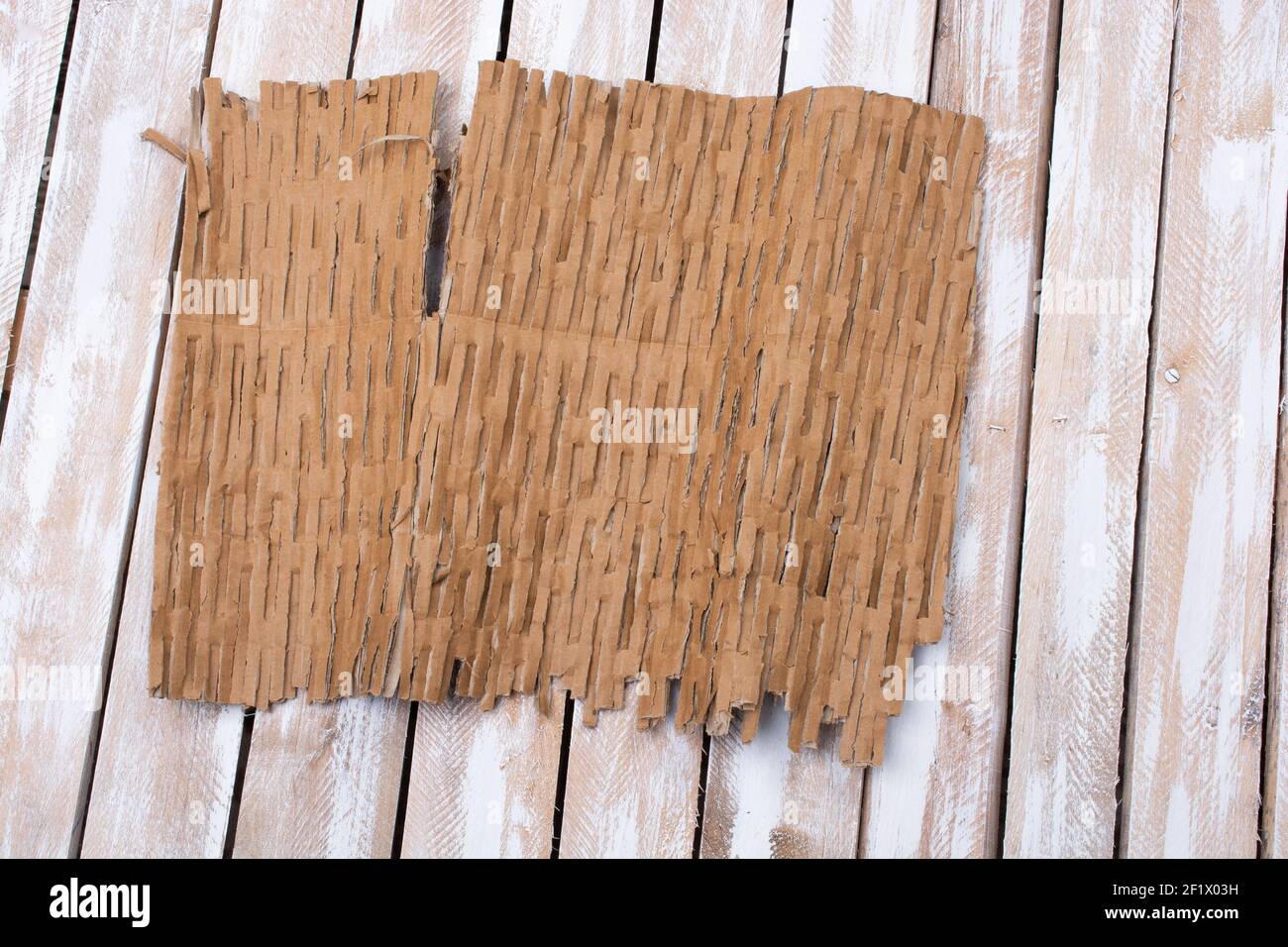 A high angle shot of old cardboard texture on wooden table Stock Photo ...