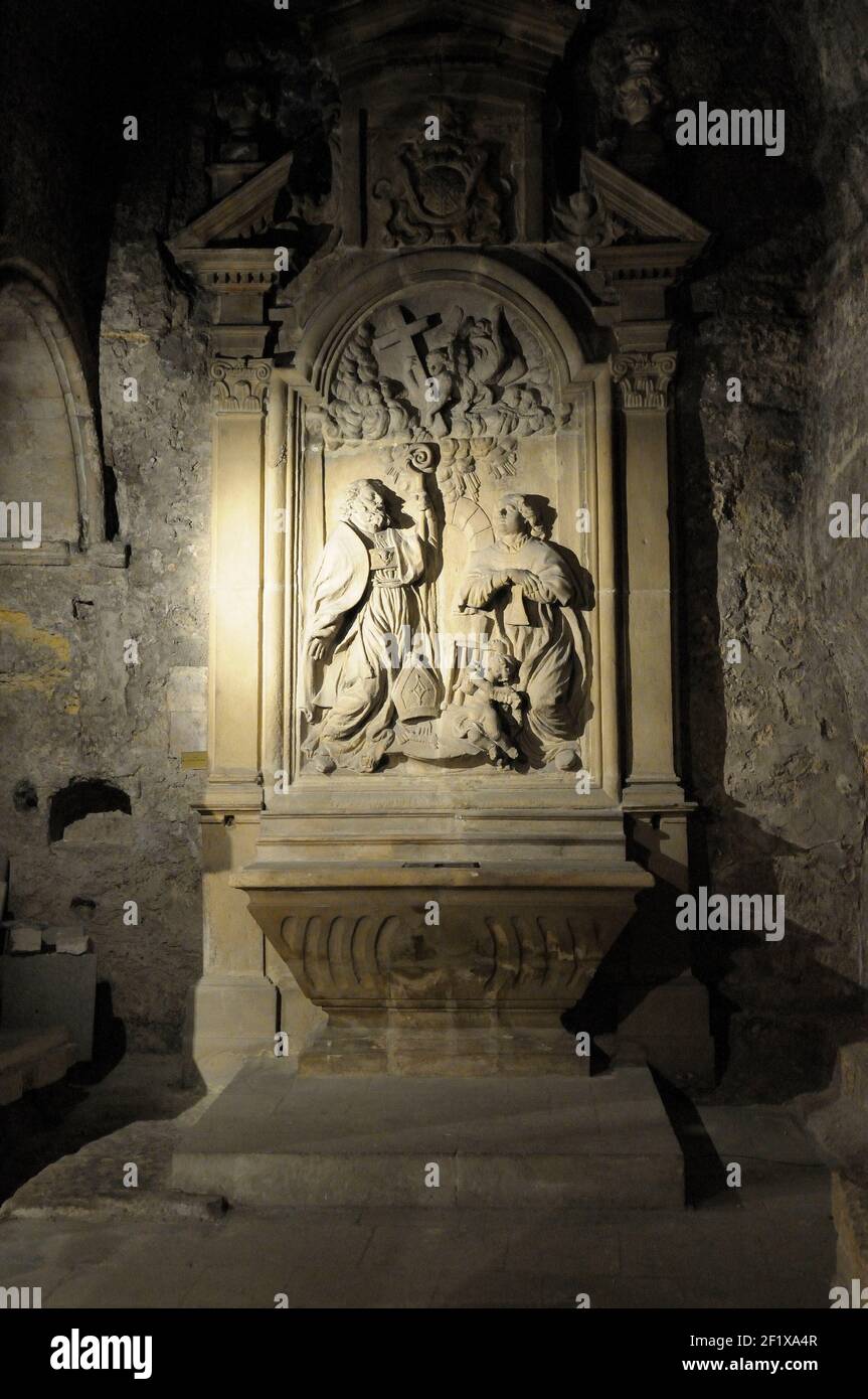 Carved stone alter with figurines in the crypt of Abbaye St-Victor ...