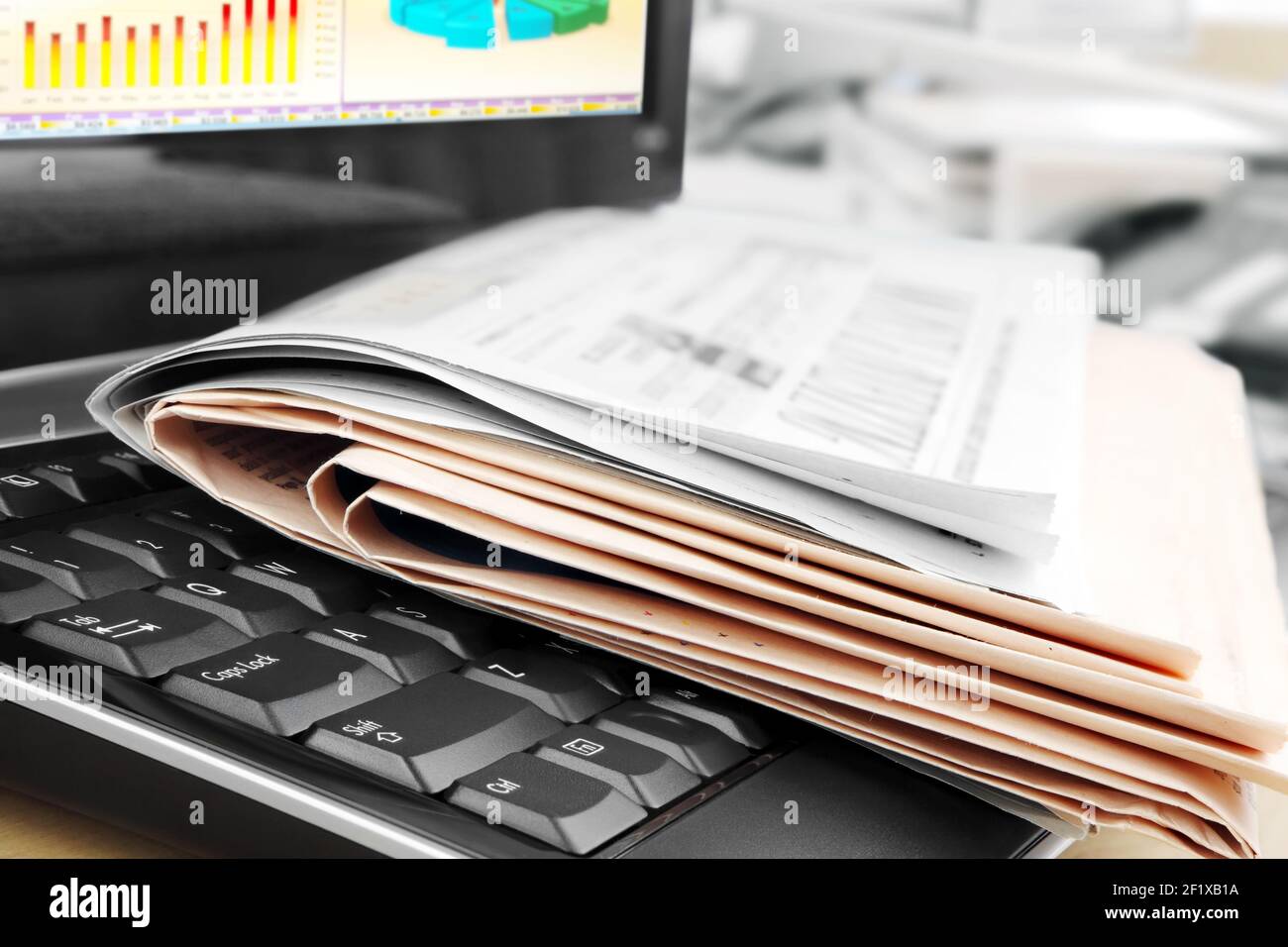 Newspapers on the Keyboard Stock Photo - Alamy