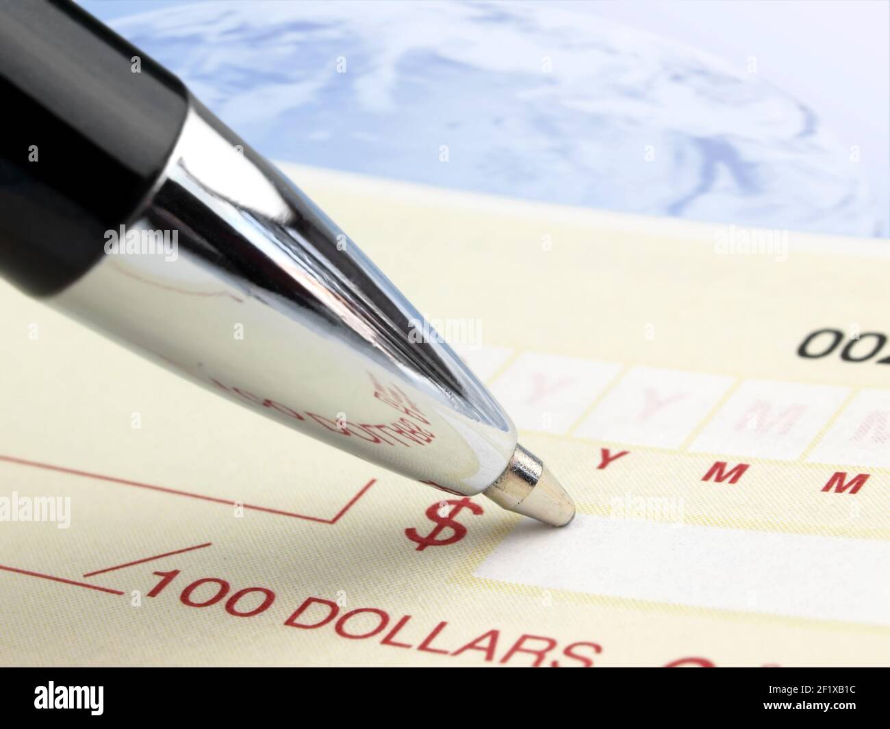 Pen on the Check Stock Photo - Alamy