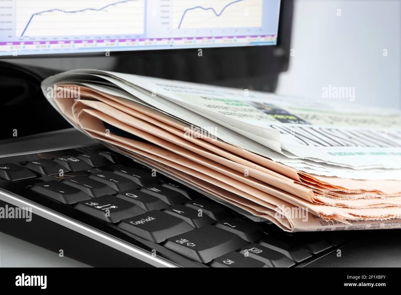 Newspapers on the Keyboard Stock Photo - Alamy