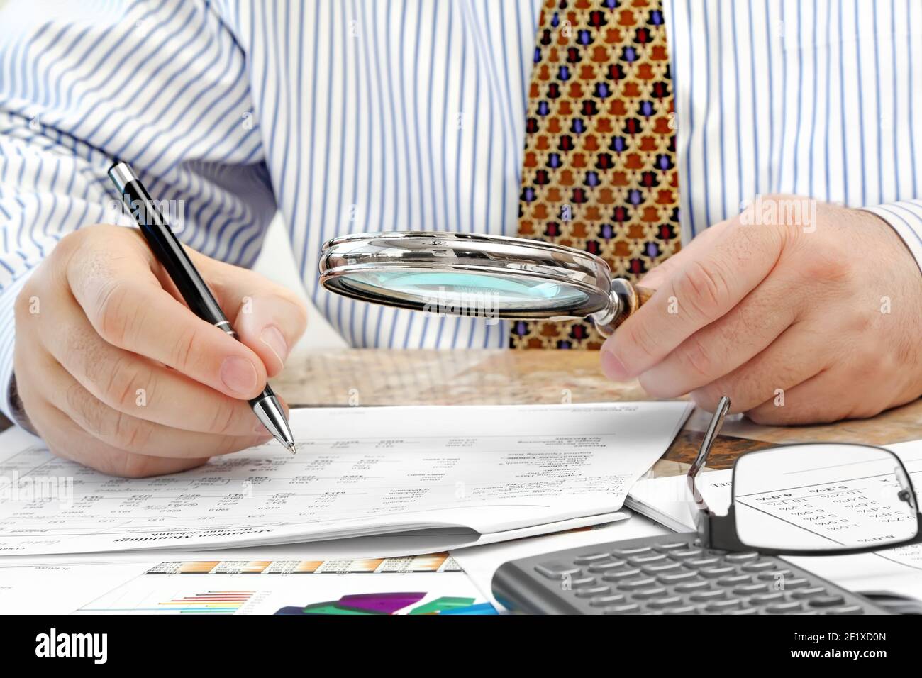 Magnifying glass calculator hi-res stock photography and images - Alamy