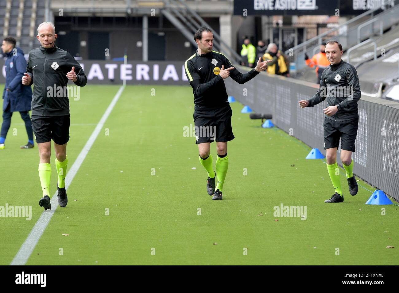 ALMELO, NETHERLANDS - MARCH 7: Assistant referee Mark Strijker, Referee ...