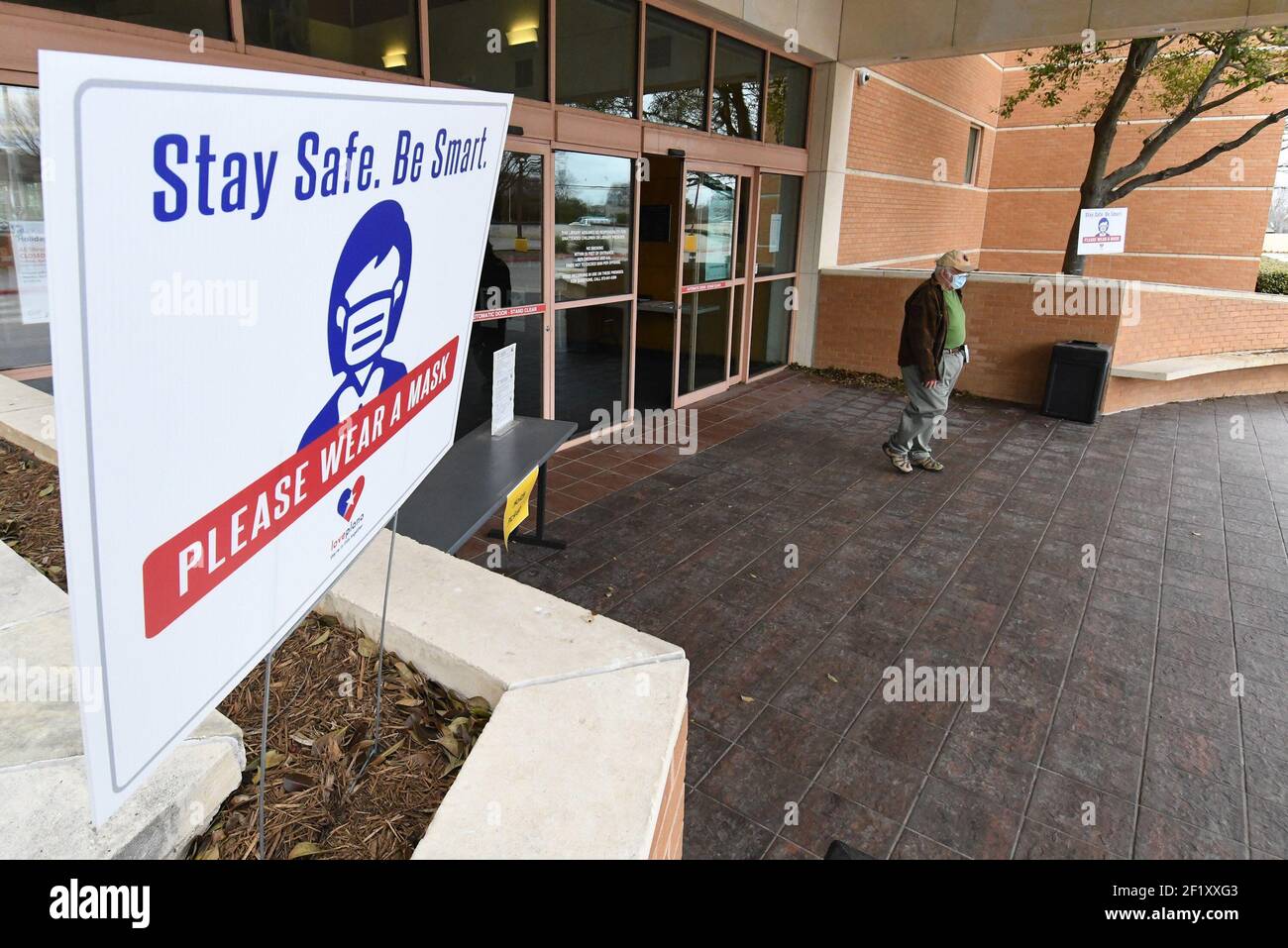 Dallas, United States. 09th Mar, 2021. Patrons wear masks at a public ...