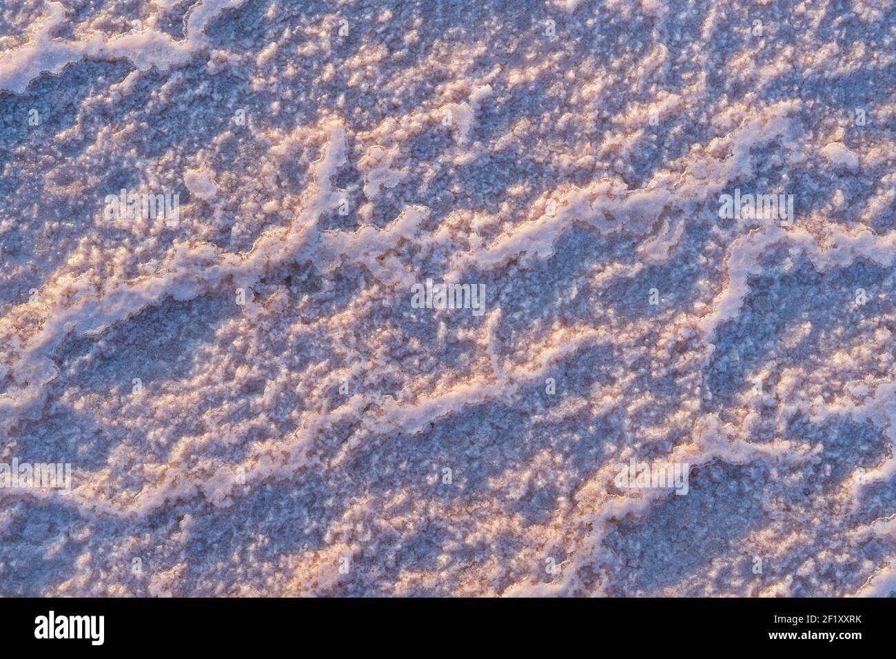 Crystals of pink salt natural background Stock Photo - Alamy