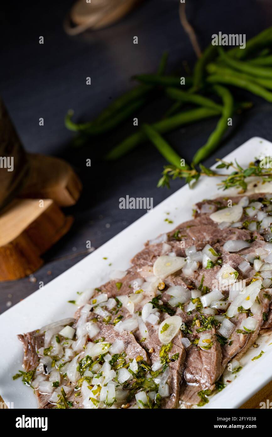 Delicious cold beef with vinaigrette Stock Photo - Alamy