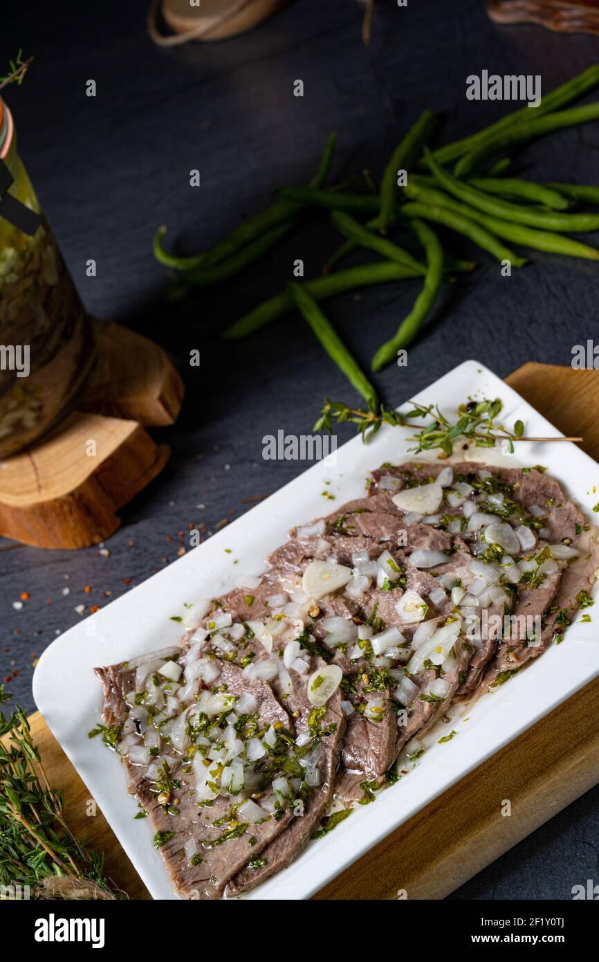 Delicious cold beef with vinaigrette Stock Photo - Alamy