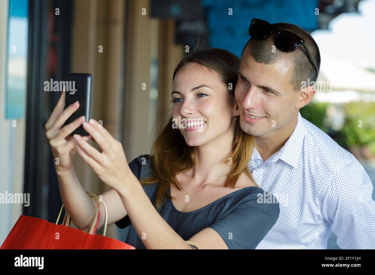 a young couple making duck faces Stock Photo - Alamy