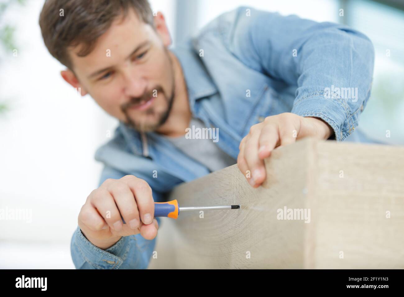 Man assemble closet hi-res stock photography and images - Alamy