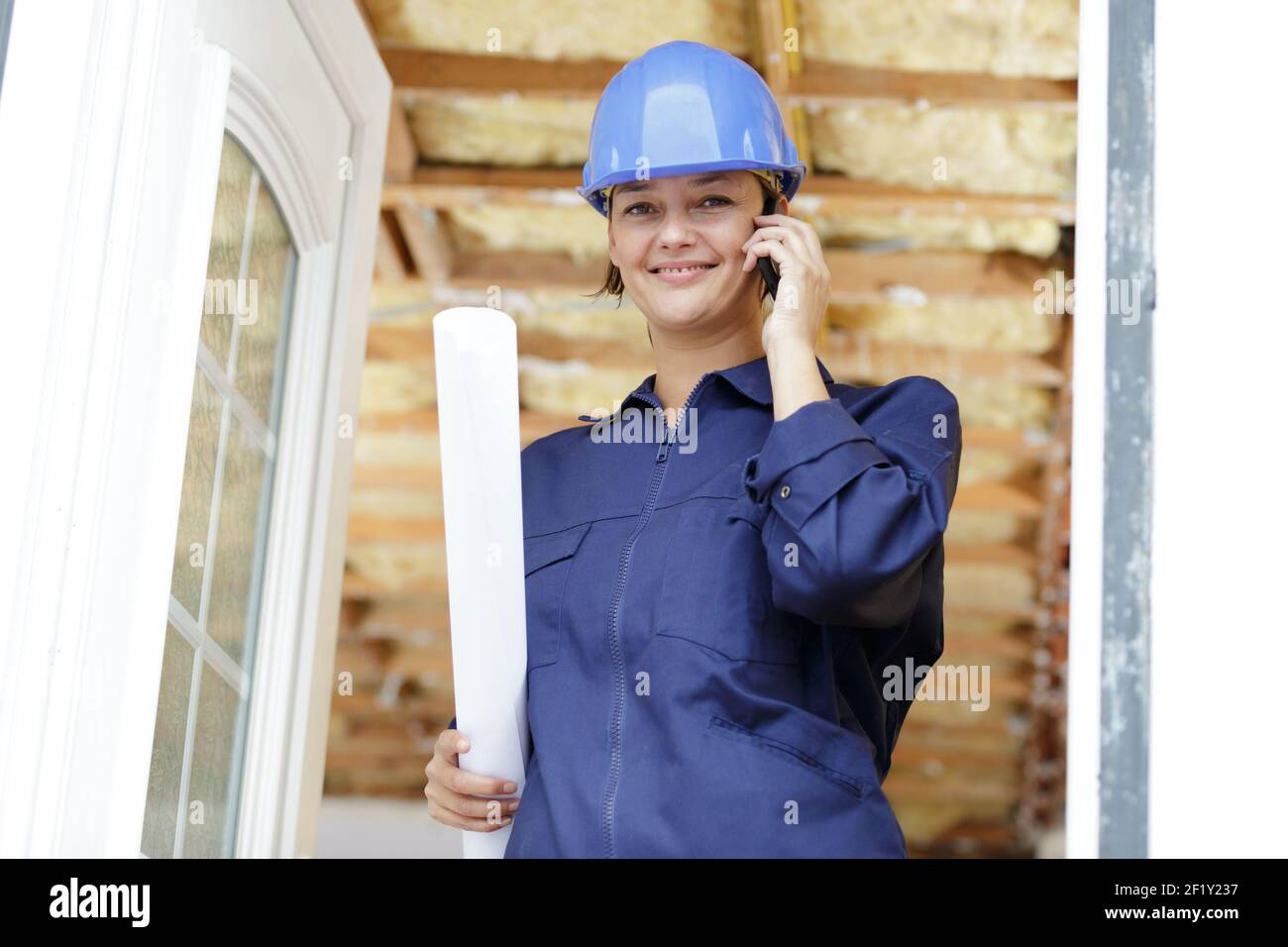Woman builder standing in hi-res stock photography and images - Alamy