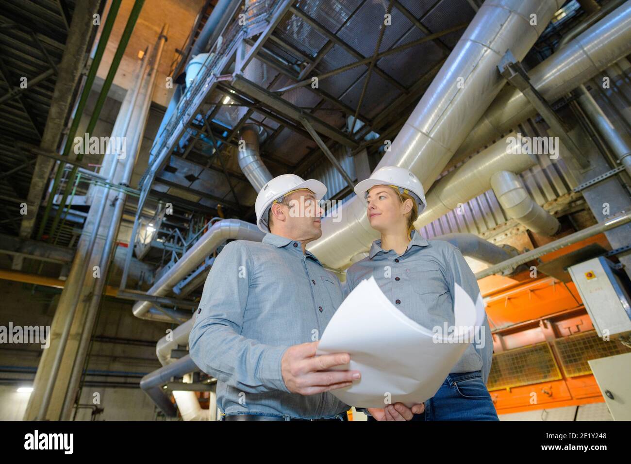 workers of an industrial factory Stock Photo - Alamy