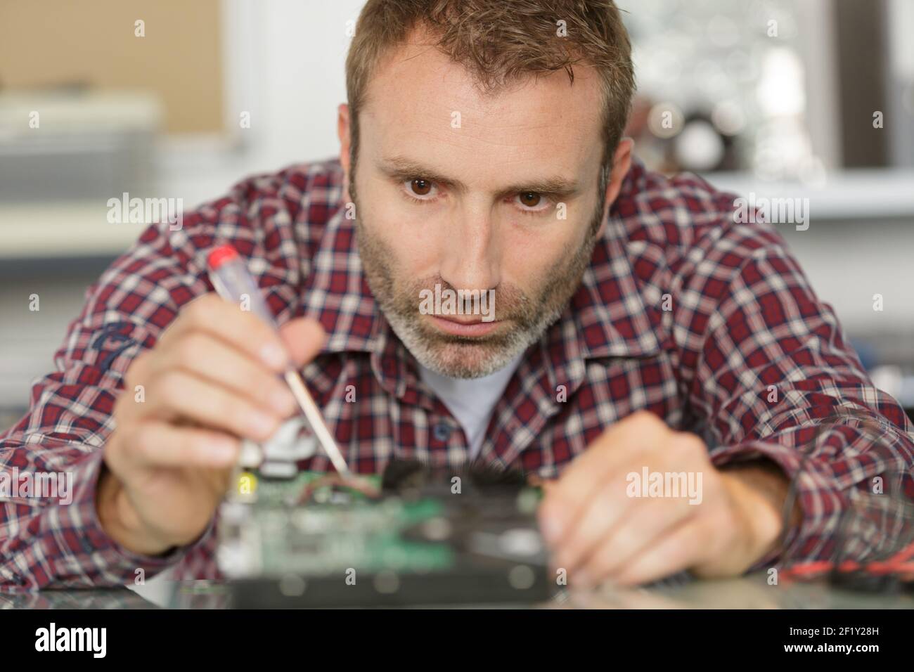 male circuit technician at work Stock Photo - Alamy