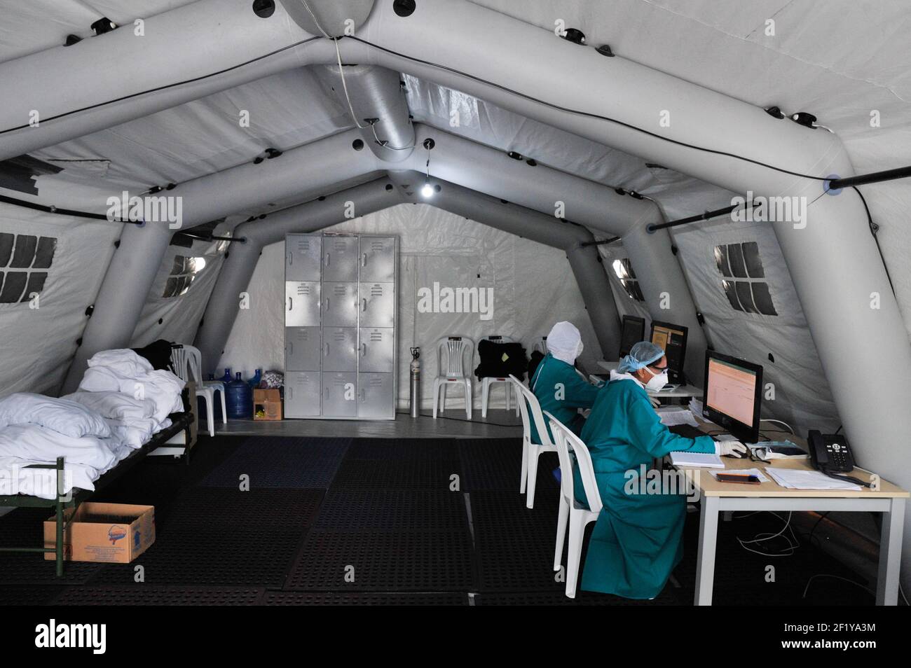 Nurses wearing Personal Protective Equipment at the IESS Hospital in ...