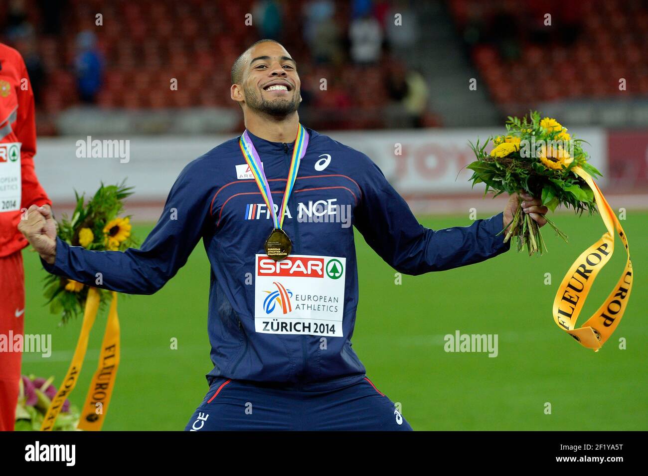 Triple jump gold medal hi-res stock photography and images - Alamy