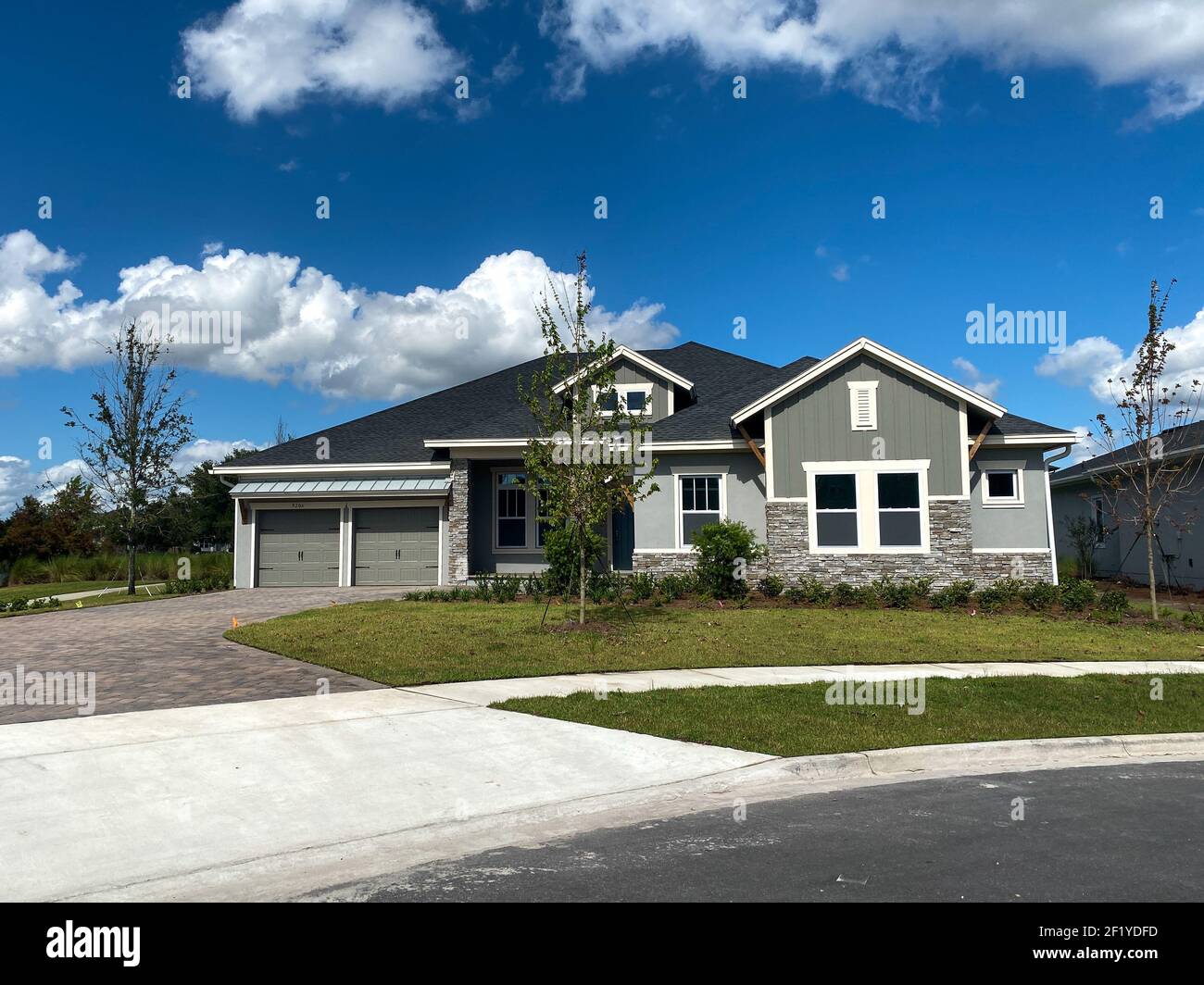 A luxury gray house in the Laureate Park neighborhood in Lake Nona ...