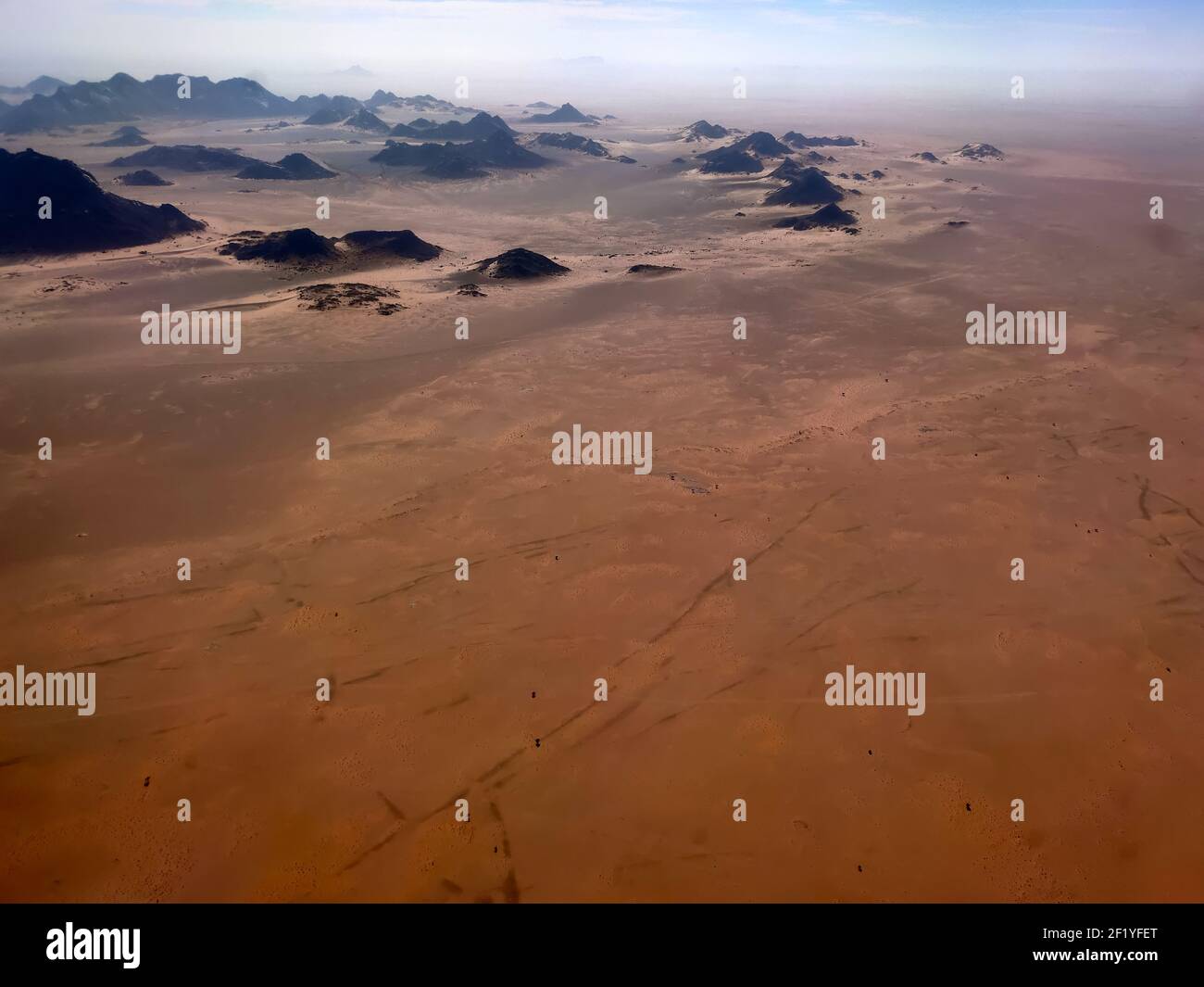 An aerial mesmerizing view of the sand dunes in the desert Stock Photo ...